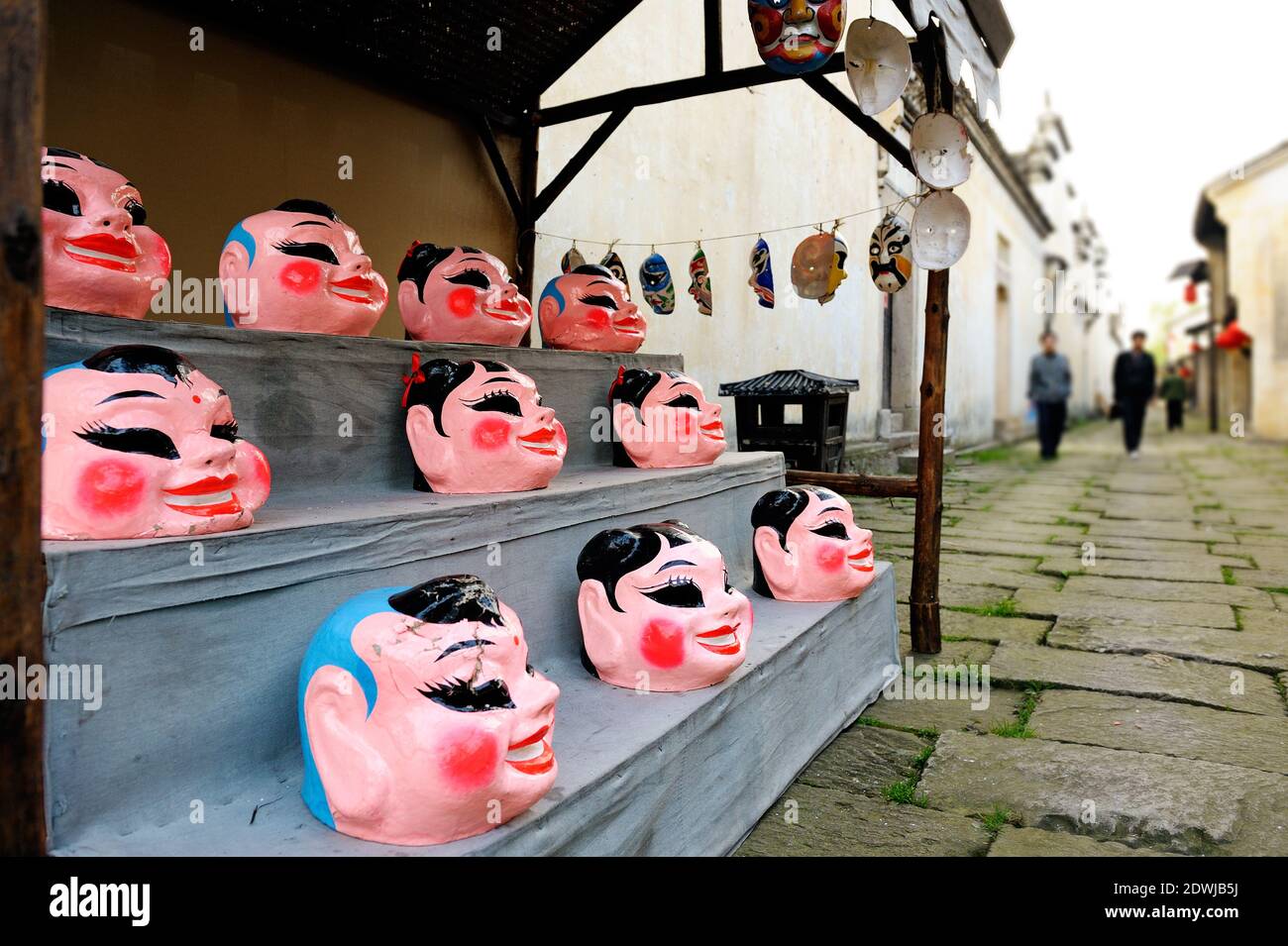 Traditional Chinese mask for sell at street stall in old village Stock ...