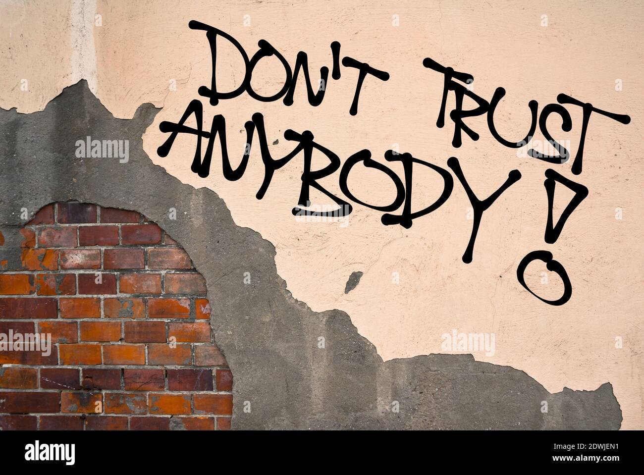 Do not Trust Anybody - Handwritten graffiti sprayed on the wall ...