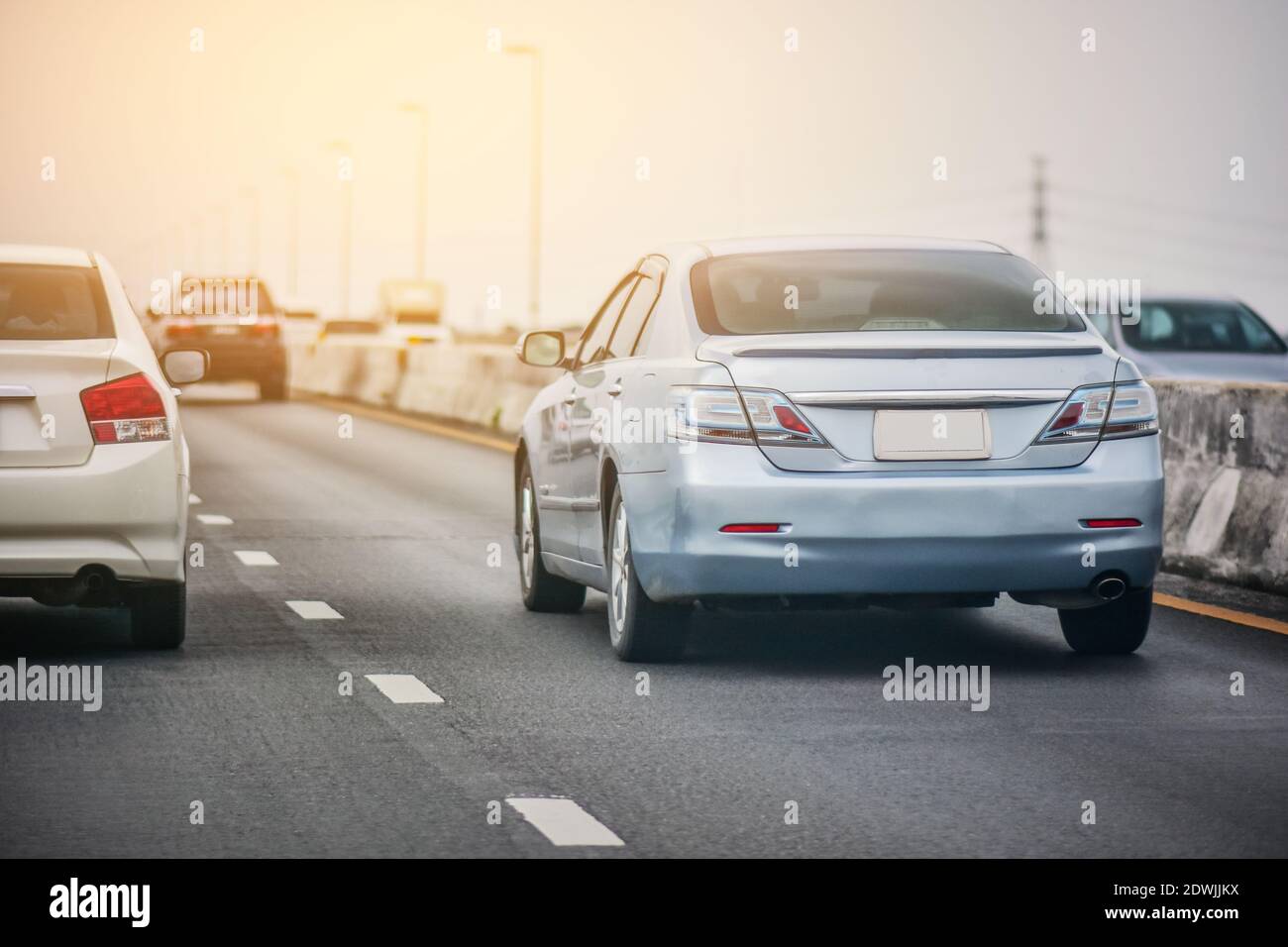 Cars driving on highway road,car driving in street city Stock Photo - Alamy