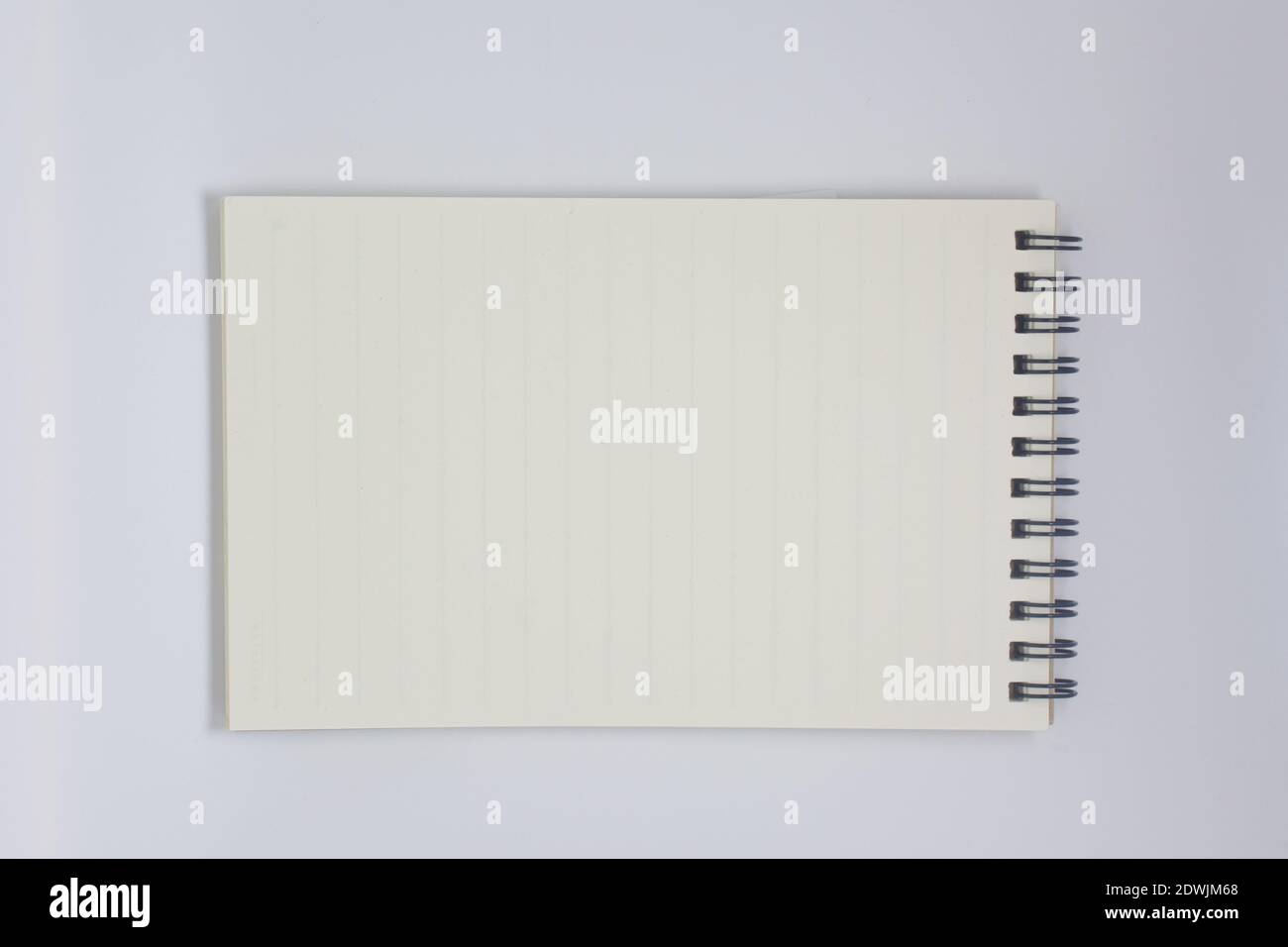 White paper note on white background Stock Photo - Alamy