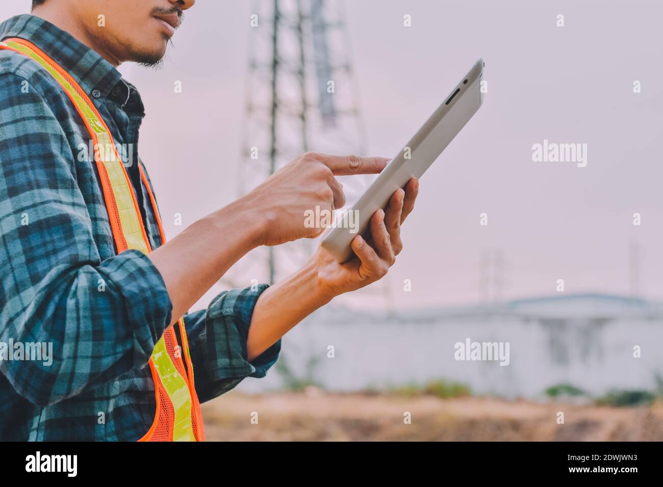 Engineer holding tablet working inspection building construction Stock ...
