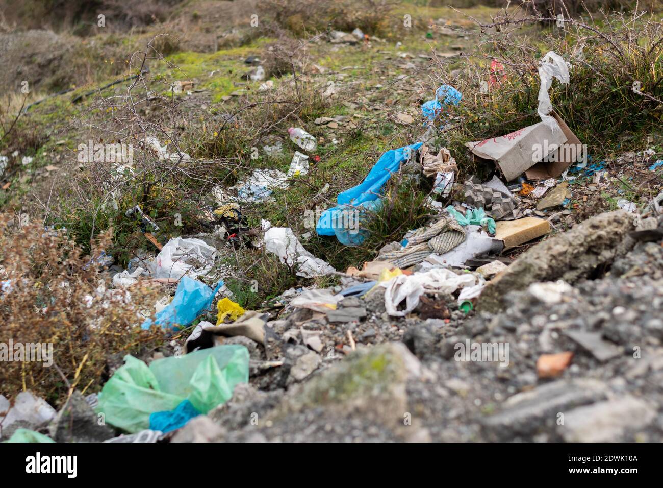 Trash thrown away in nature, environmental problems. Nature disaster ...