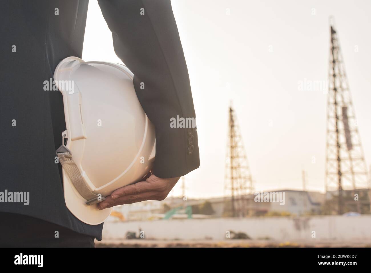 Close up project manager holding helmet hard hat construction building ...