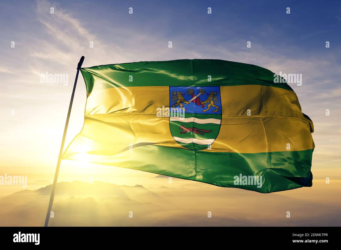 Pozega-Slavonia county of Croatia flag waving on the top sunrise mist ...