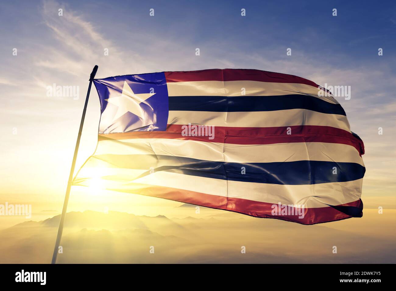 Maranhao state of Brazil flag waving on the top sunrise mist fog Stock ...