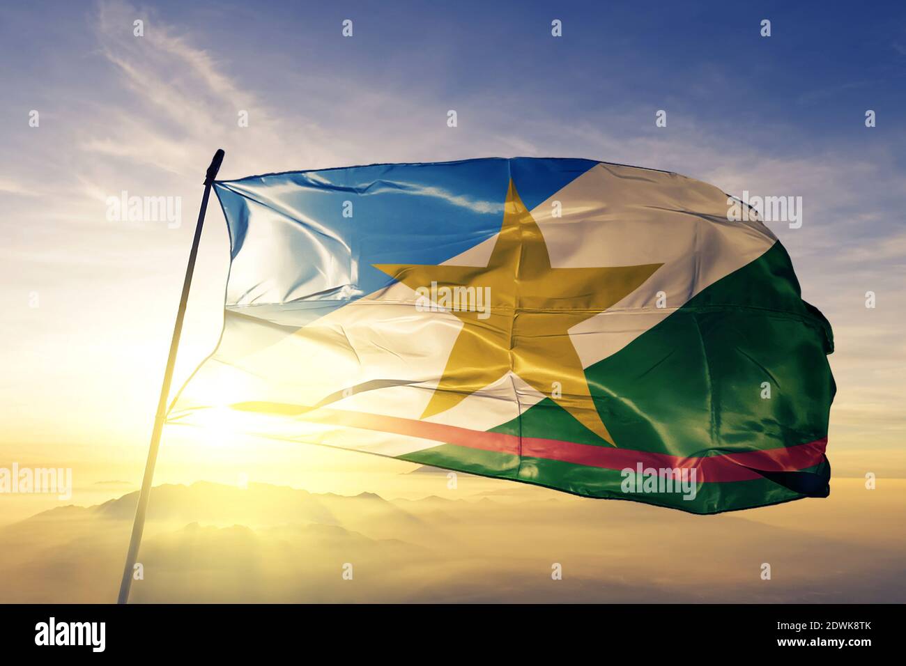 Roraima state of Brazil flag waving on the top sunrise mist fog Stock ...