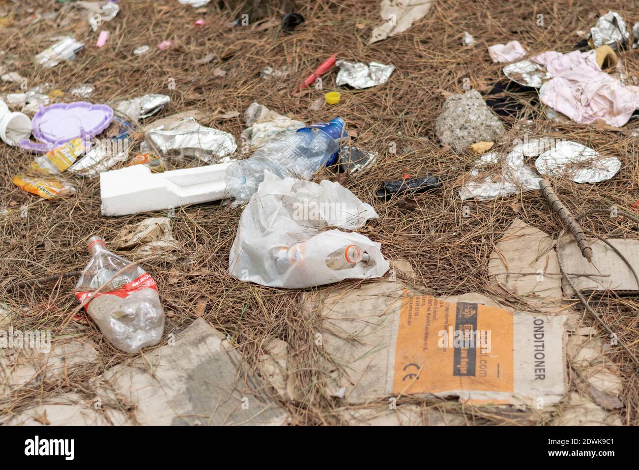 Trash thrown away in nature, environmental problems. Nature disaster ...