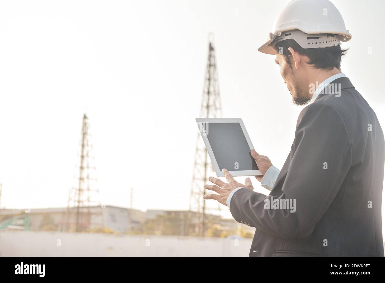 Project manager holding tablet inspection estate construction building ...
