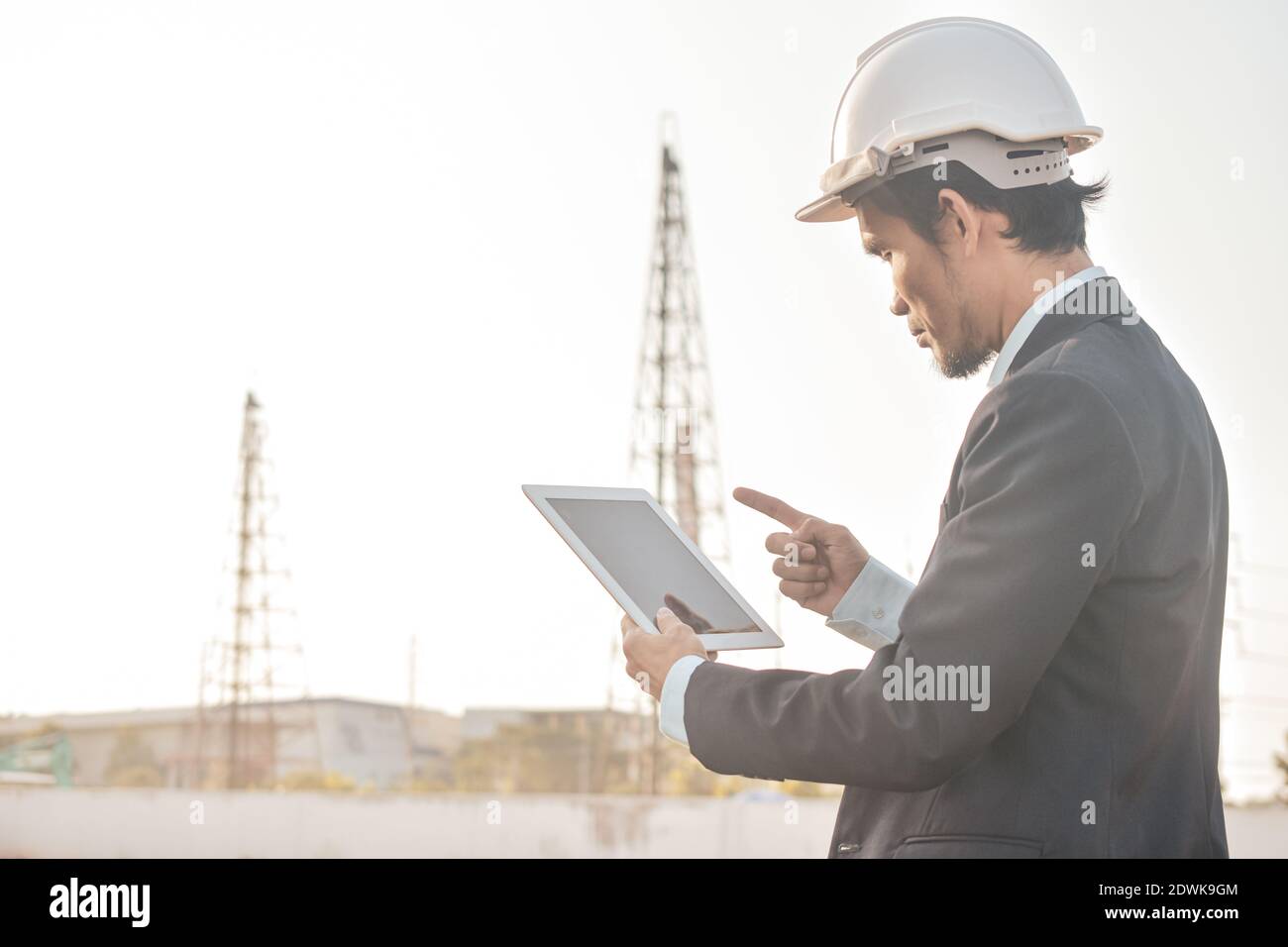 Project manager holding tablet inspection estate construction building ...
