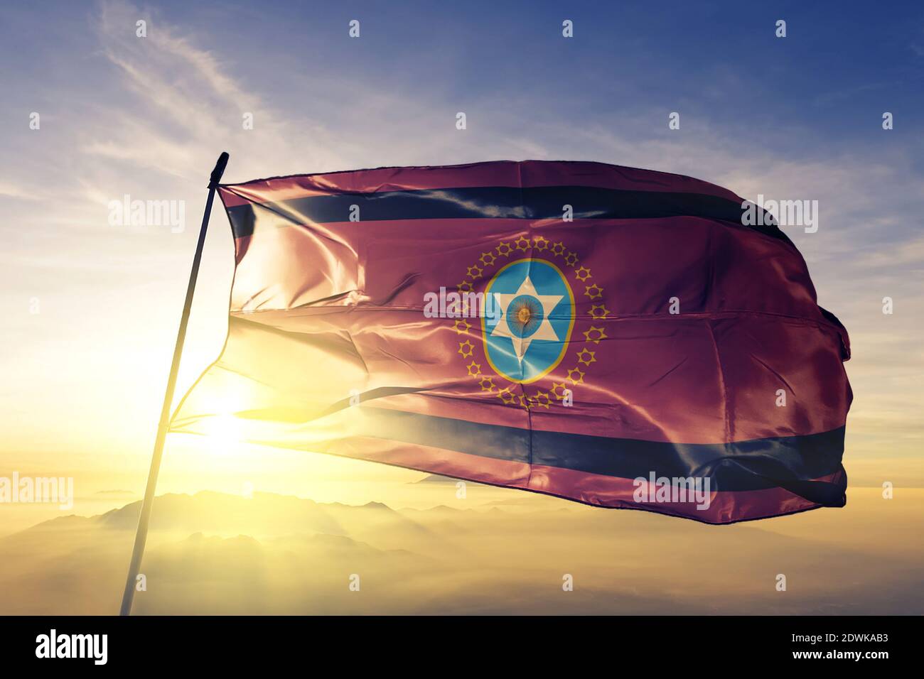 Salta province of Argentina flag waving on the top sunrise mist fog ...