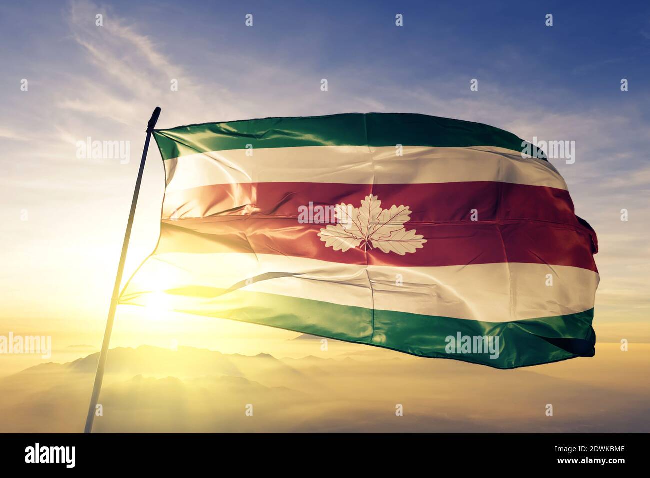 Boyaca department of Colombia flag waving on the top sunrise mist fog ...