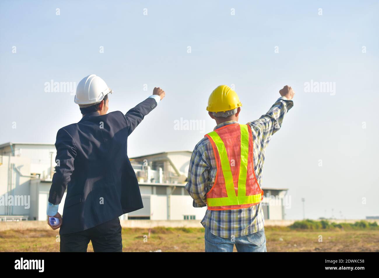 Project manager and Engineer construction holding hand success project ...