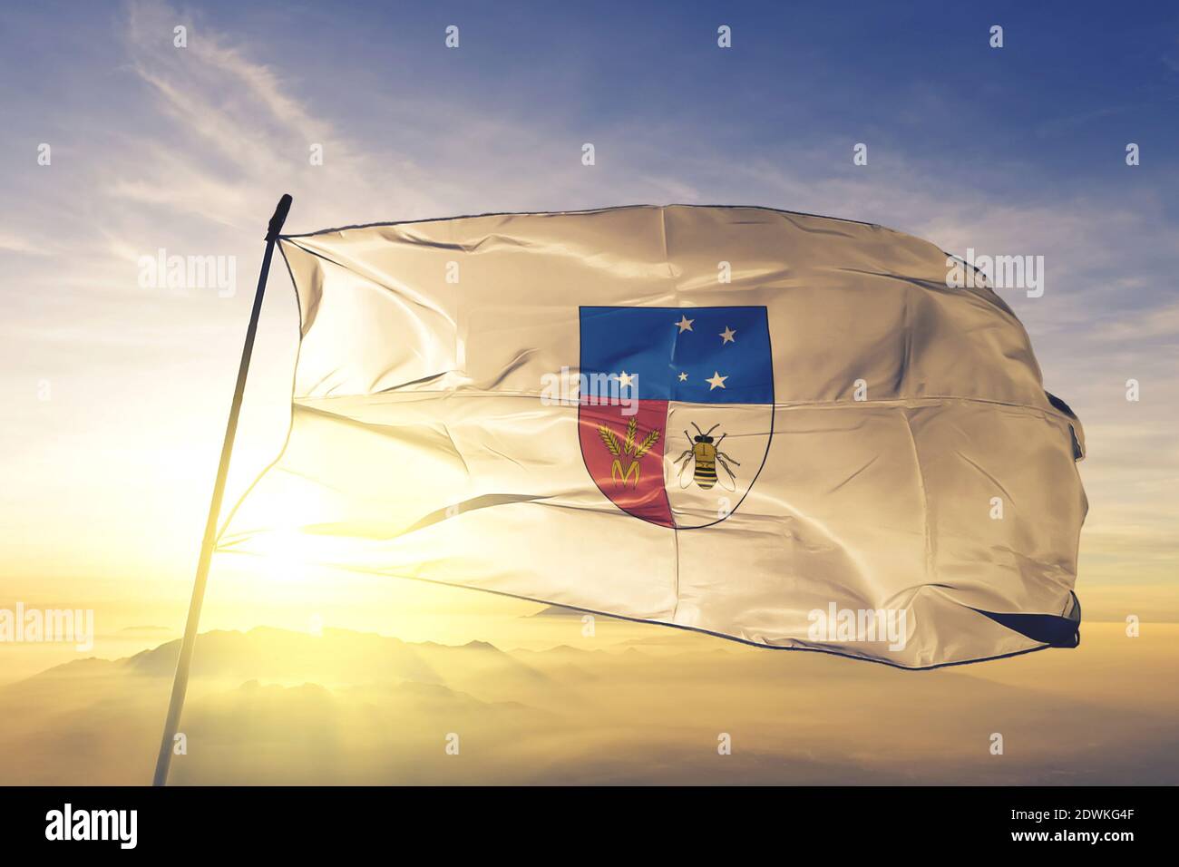 Colonia department of Uruguay flag waving on the top sunrise mist fog ...