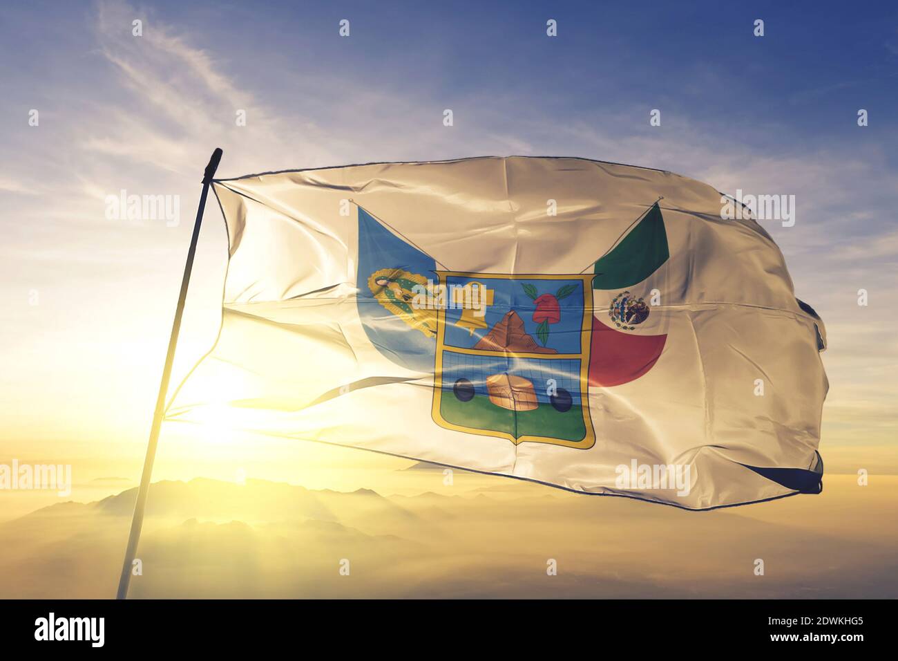 Hidalgo state of Mexico flag waving on the top sunrise mist fog Stock ...