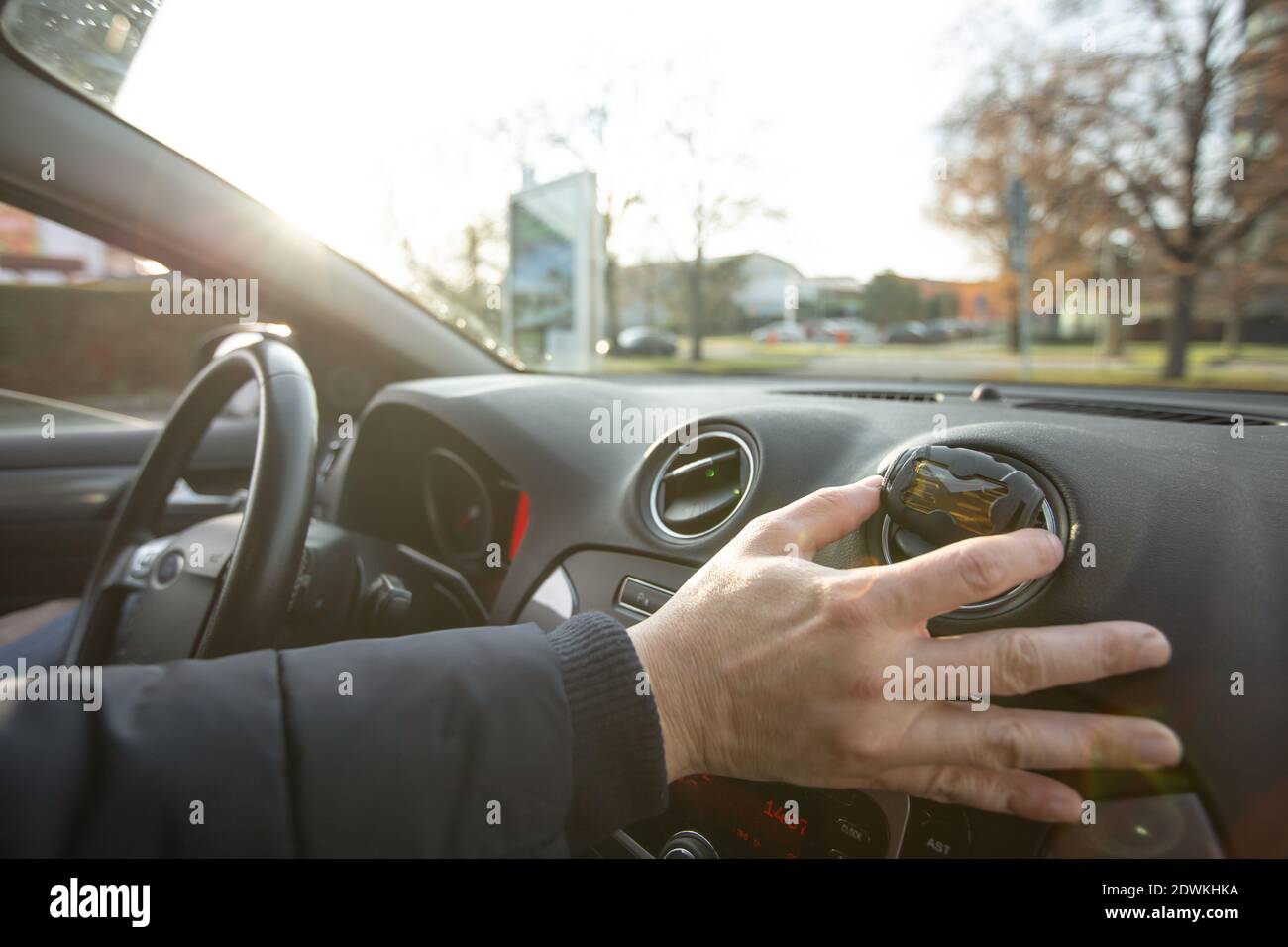 Man refilling car perfume or car scent in the interior of car Stock ...