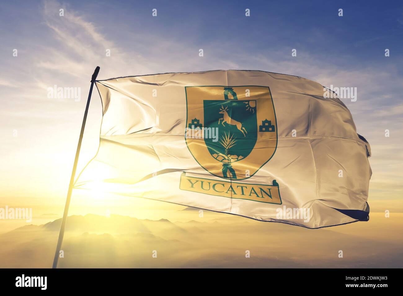 Yucatan state of Mexico flag waving on the top sunrise mist fog Stock ...