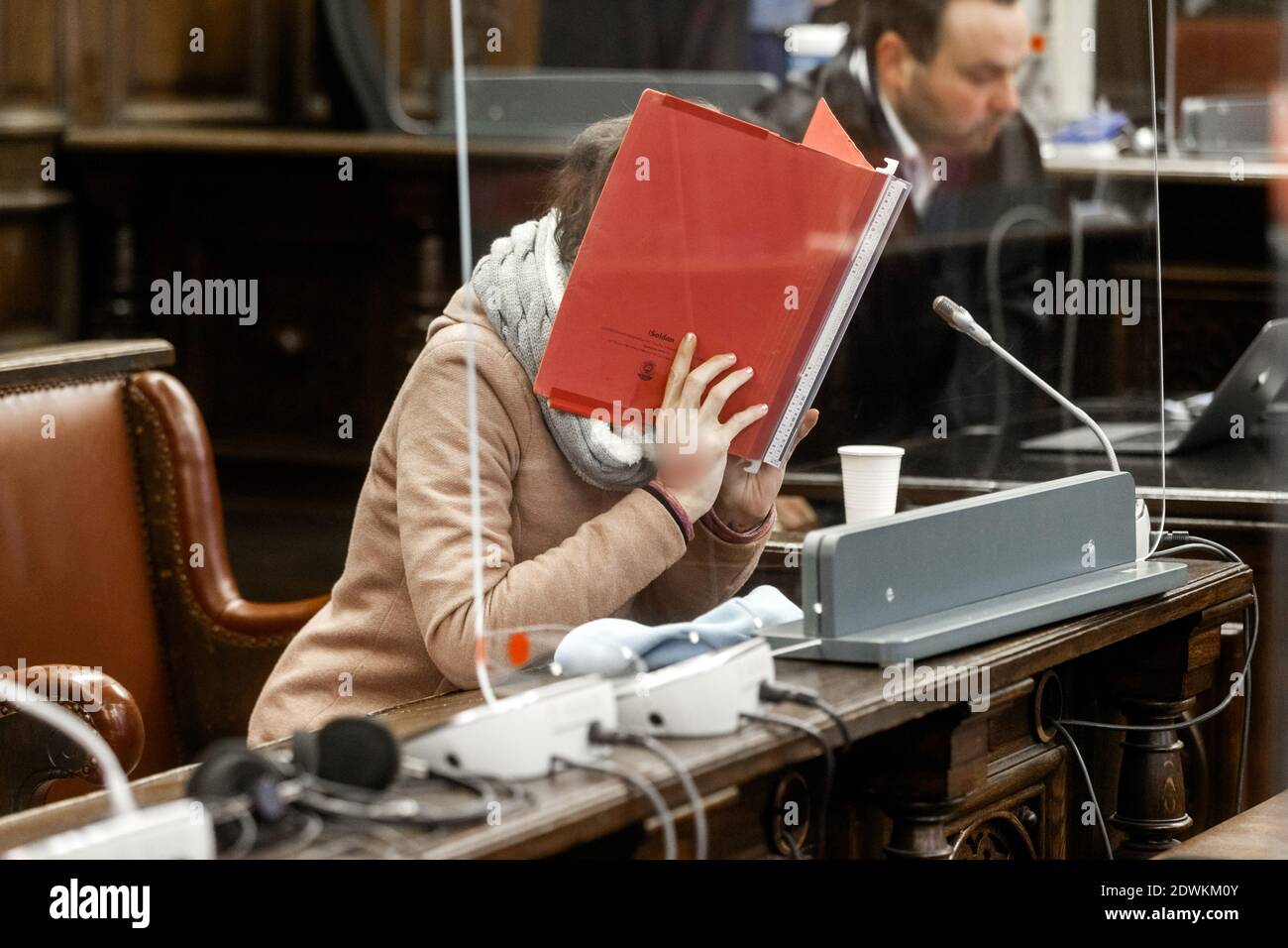 Hamburg, Germany. 23rd Dec, 2020. The 37-year-old defendant sits in the ...