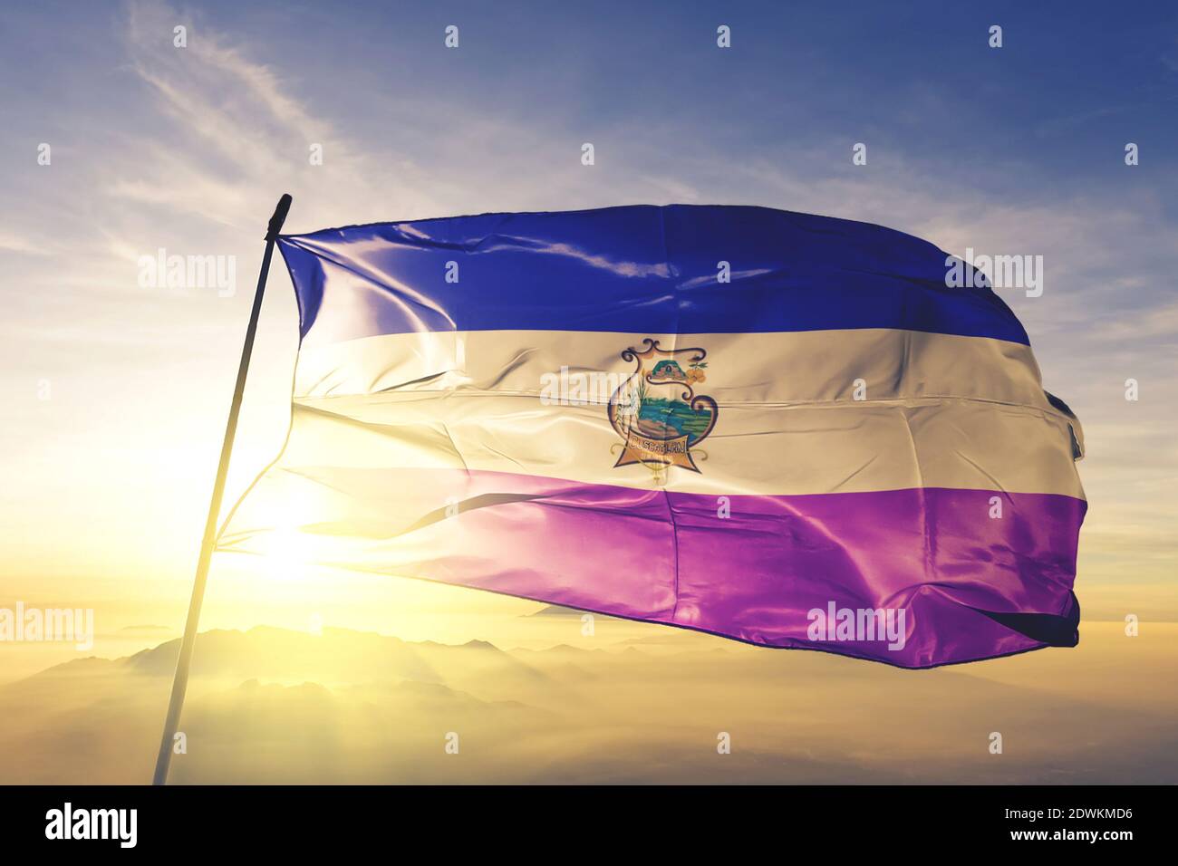Cuscatlan department of El Salvador flag waving on the top sunrise mist ...