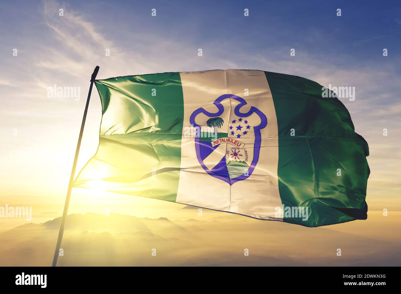 Retalhuleu department of Guatemala flag waving on the top sunrise mist ...