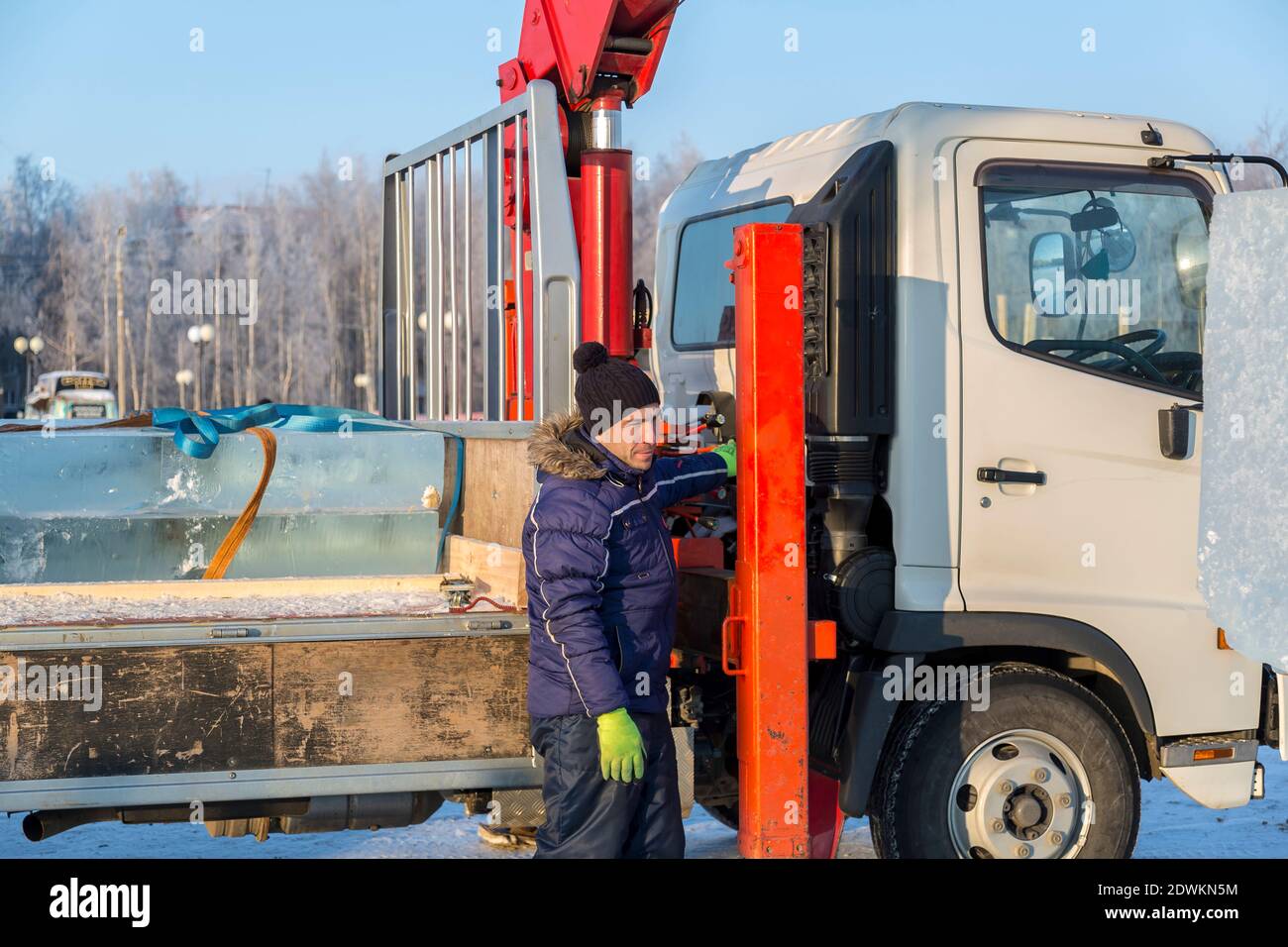 The hydraulic manipulator driver focuses on crane control Stock Photo ...