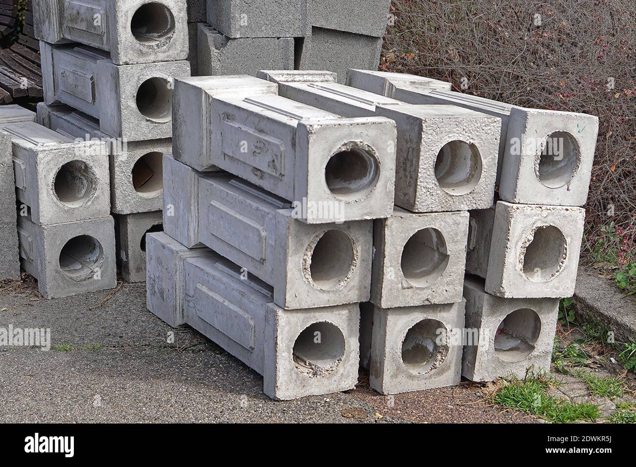 Stack of concrete columns pillars construction material Stock Photo - Alamy
