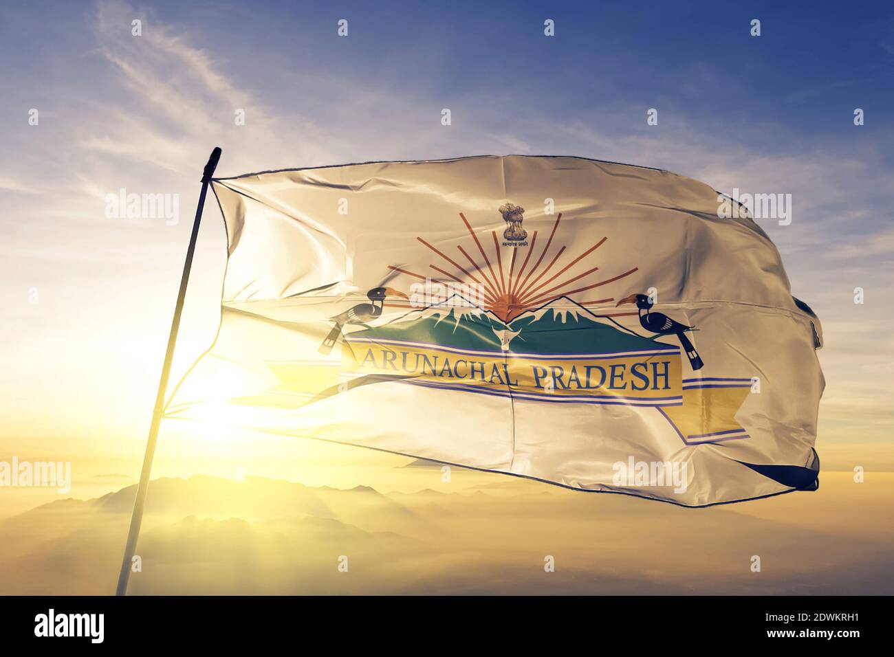 Arunachal Pradesh state of India flag waving on the top sunrise mist ...