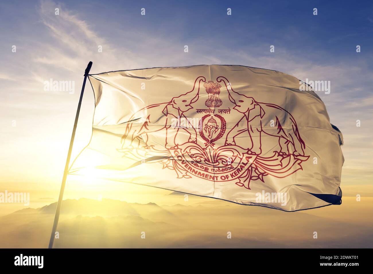 Kerala state of India flag waving on the top sunrise mist fog Stock ...