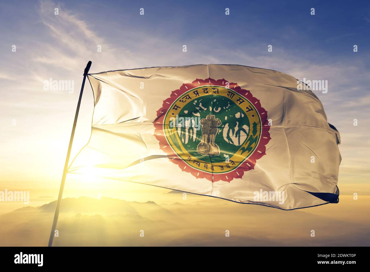 Madhya Pradesh state of India flag waving on the top sunrise mist fog ...