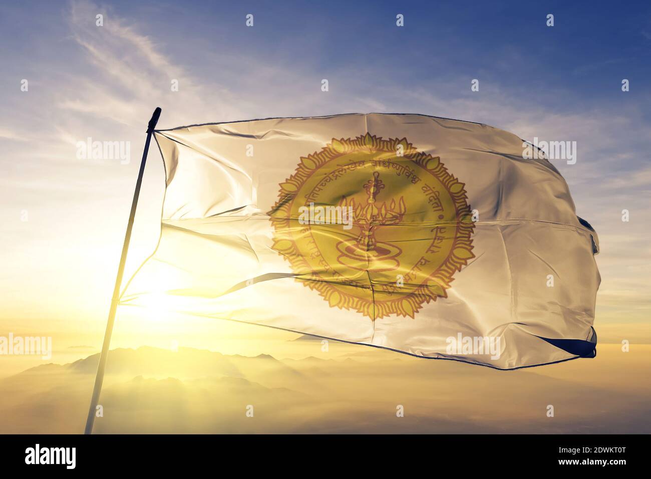 Maharashtra state of India flag waving on the top sunrise mist fog ...