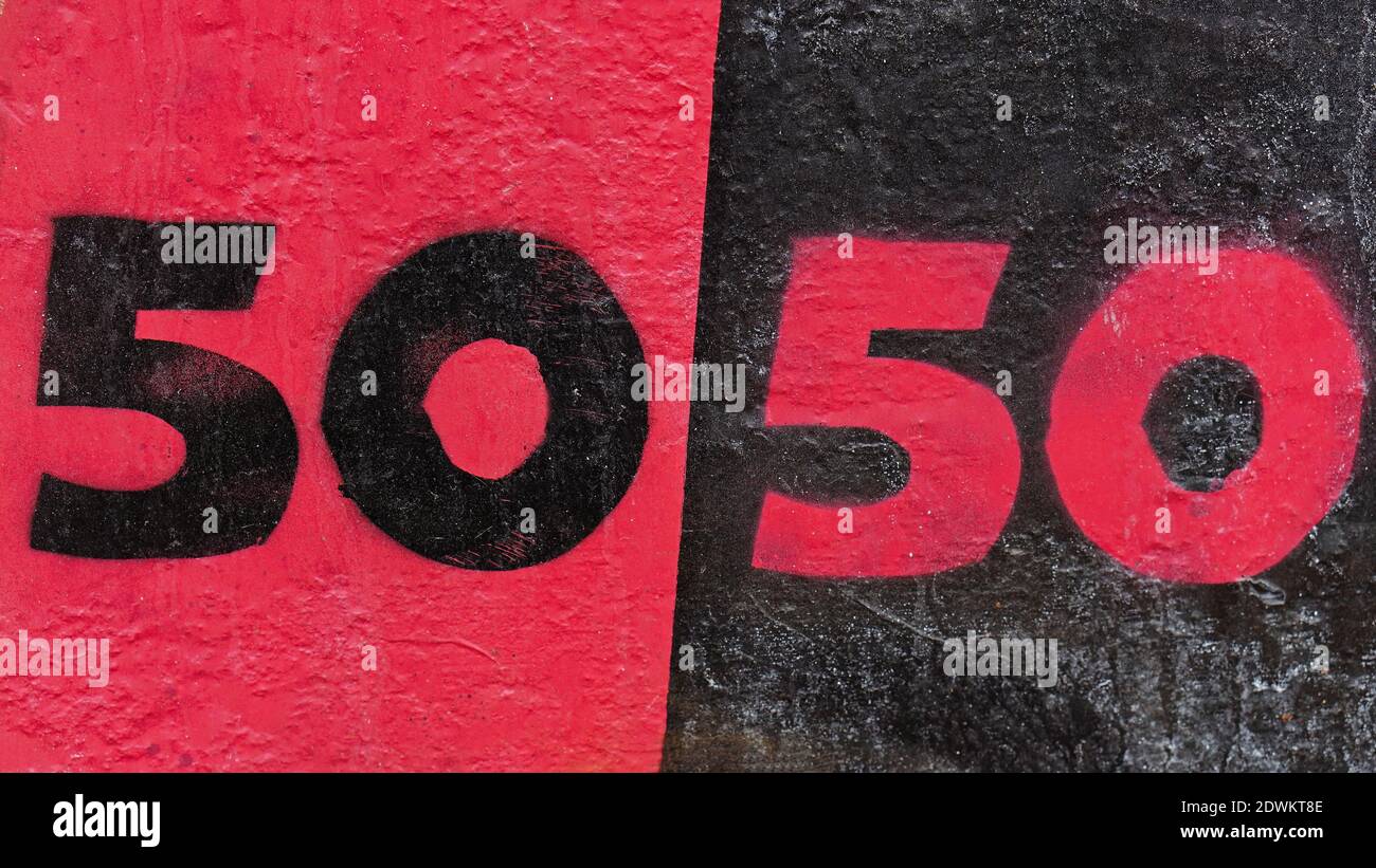 Red and black fifty fifty numbers sign Stock Photo - Alamy