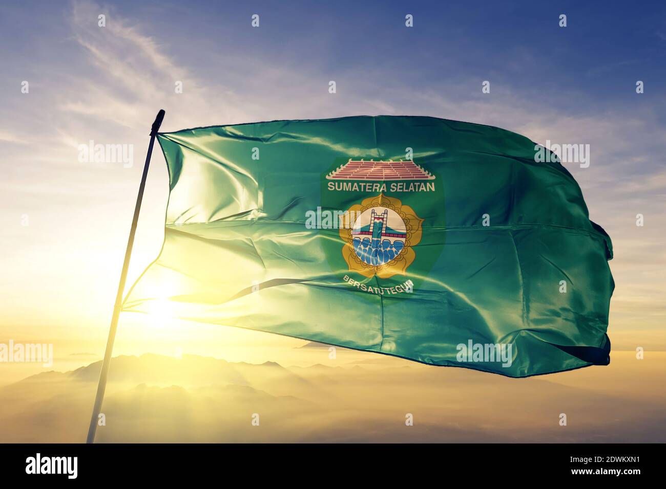 South Sumatra province of Indonesia flag waving on the top sunrise mist ...