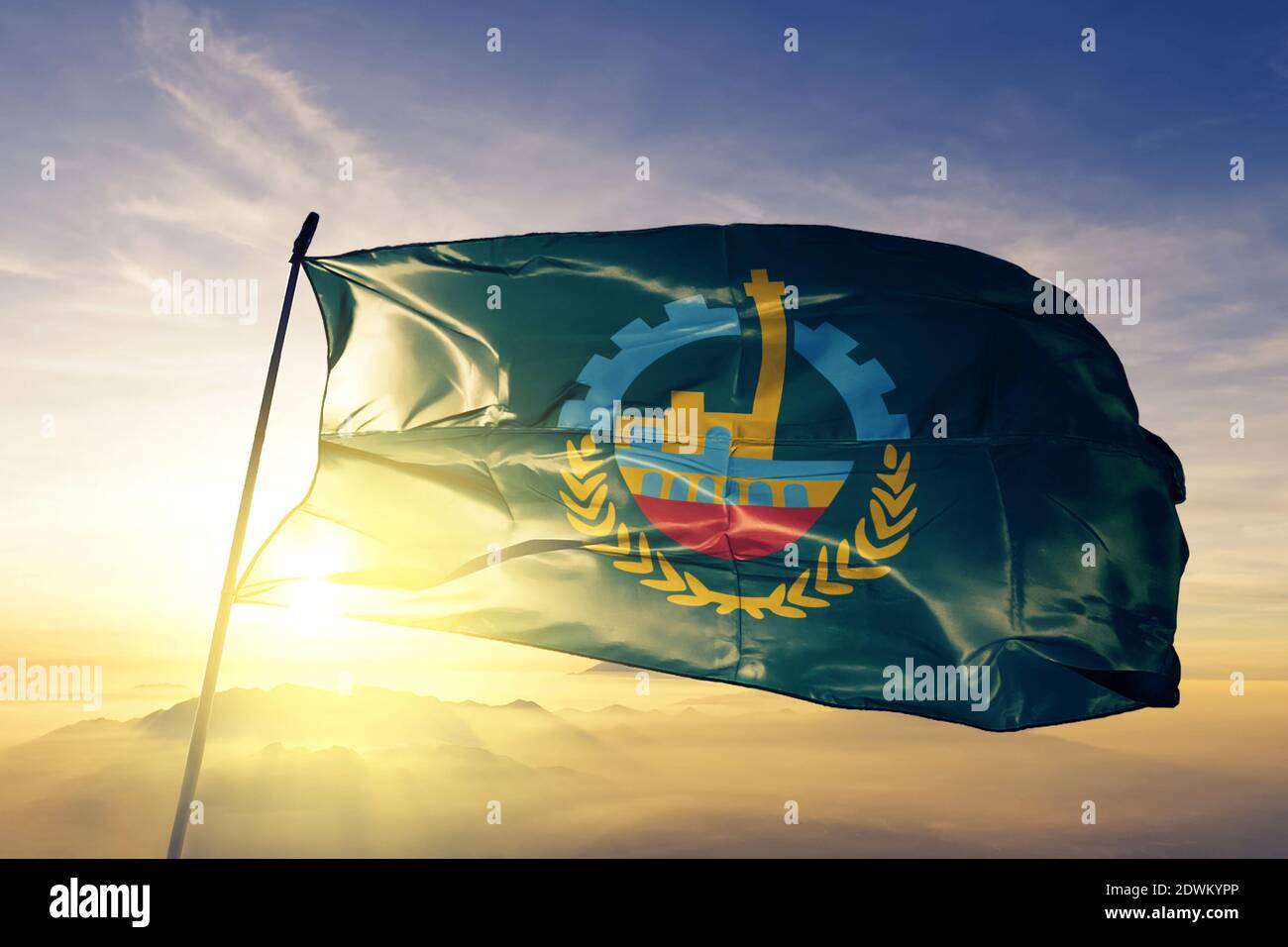 Qalyubia governorate of Egypt flag waving on the top sunrise mist fog ...
