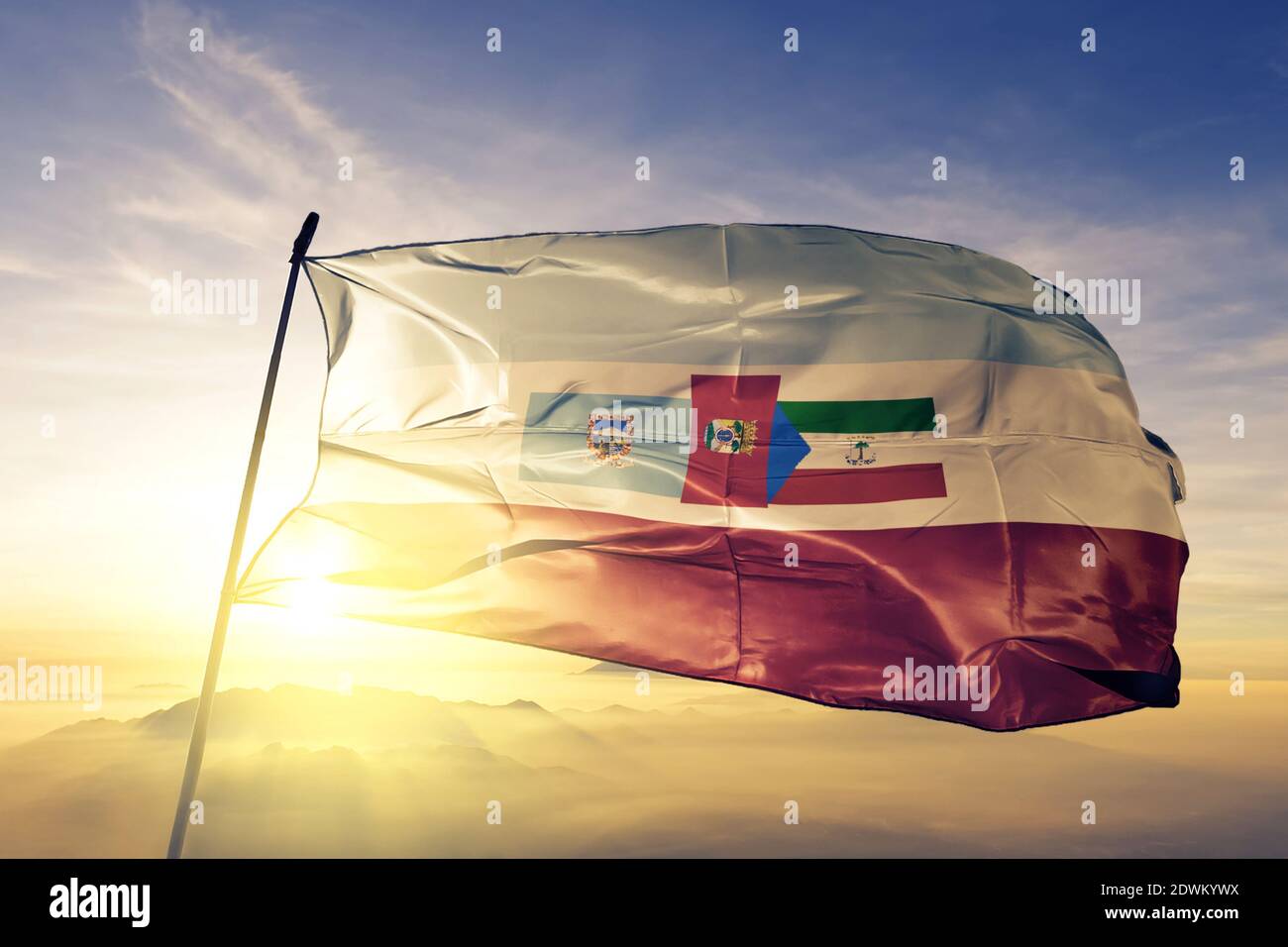 Bioko Norte province of Equatorial Guinea flag waving sunrise mist fog ...