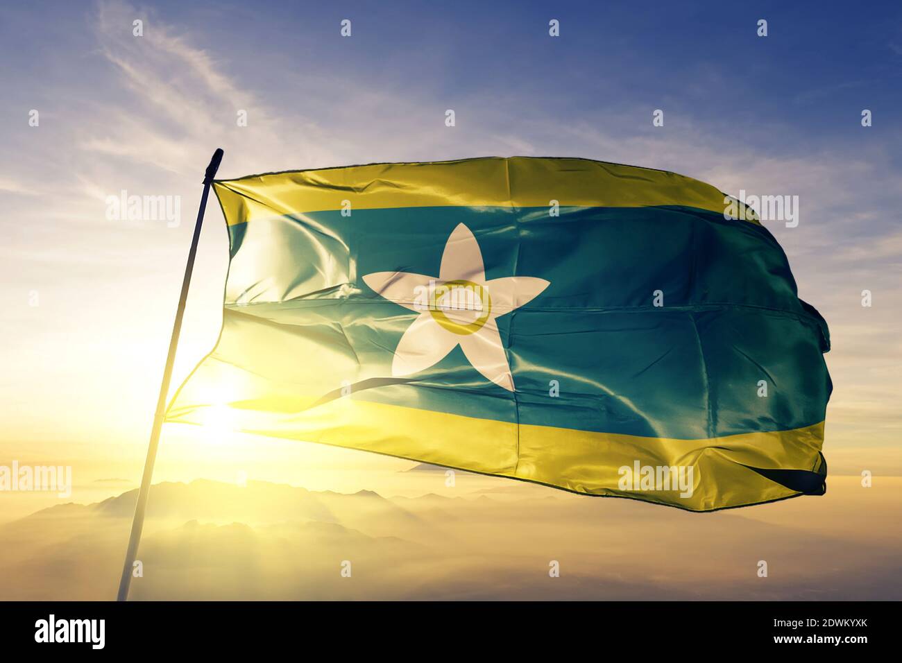 Ehime prefecture of Japan flag waving on the top sunrise mist fog Stock ...