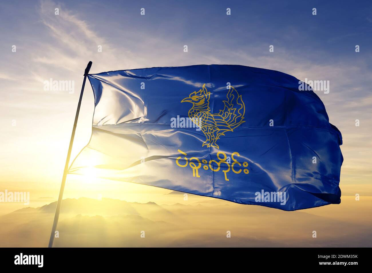 Bago region of Myanmar flag waving on the top sunrise mist fog Stock ...