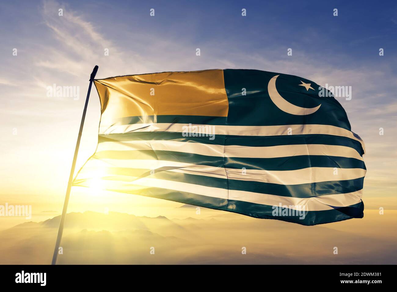 Azad Jammu and Kashmir of Pakistan flag waving on the top sunrise mist ...