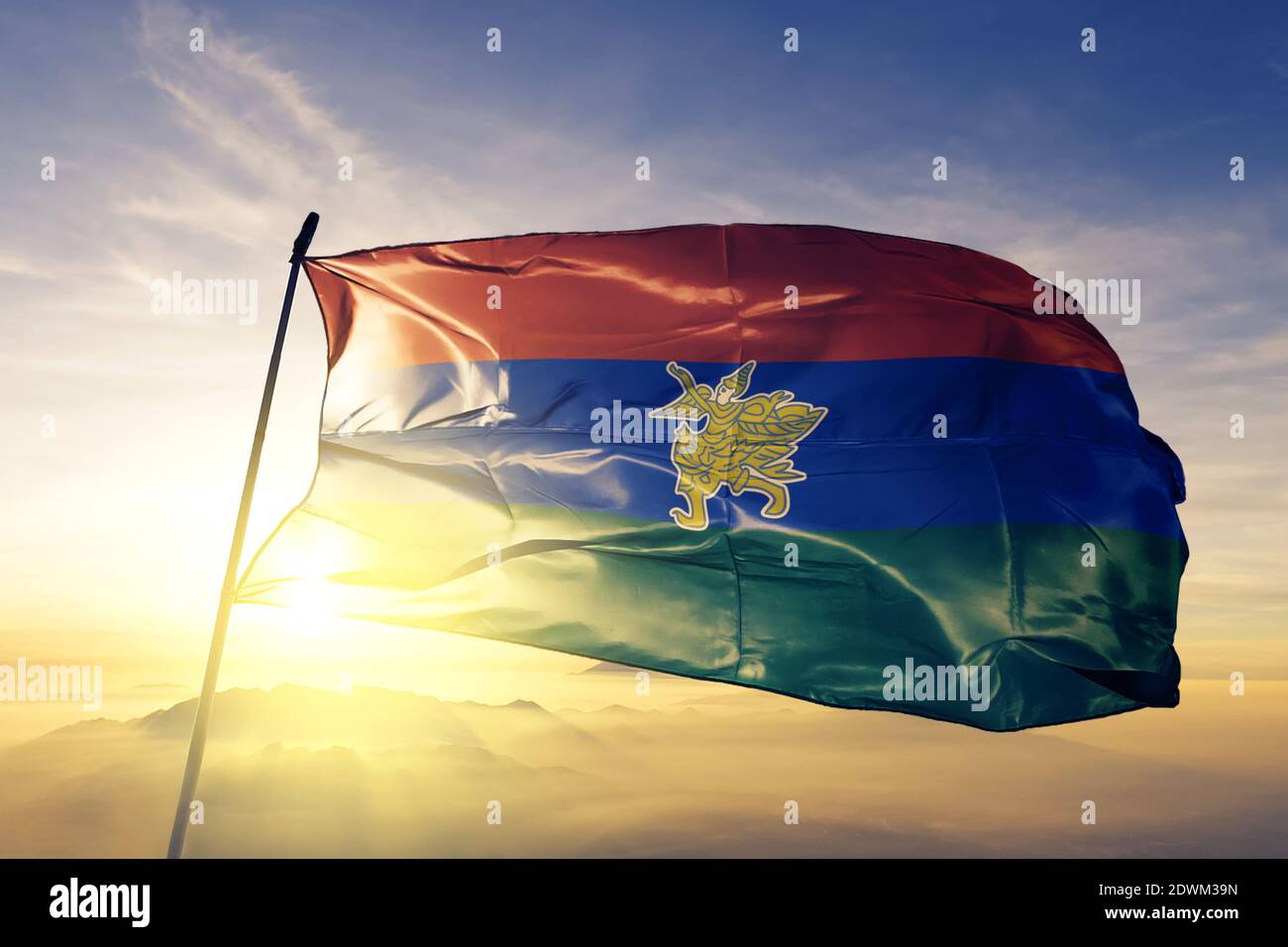 Kayah state of Myanmar flag waving on the top sunrise mist fog Stock ...