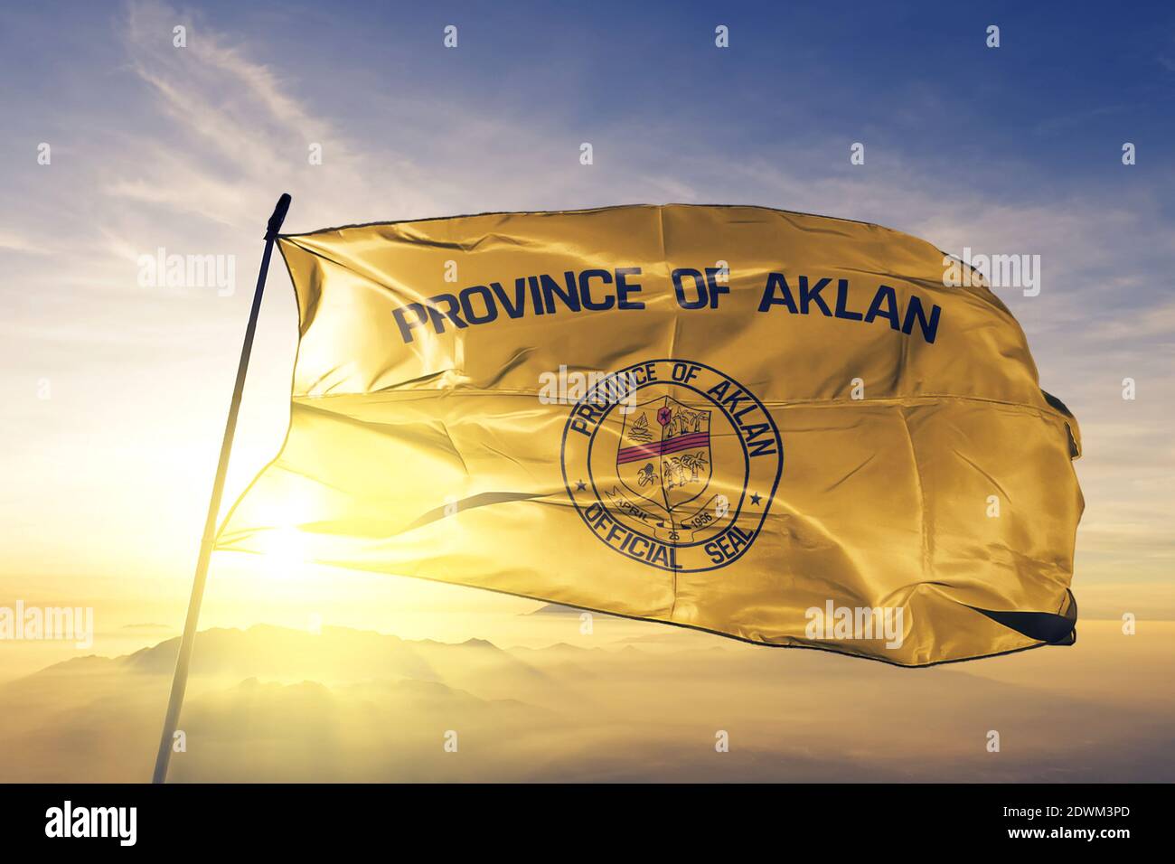 Aklan province of Philippines flag waving on the top sunrise mist fog ...