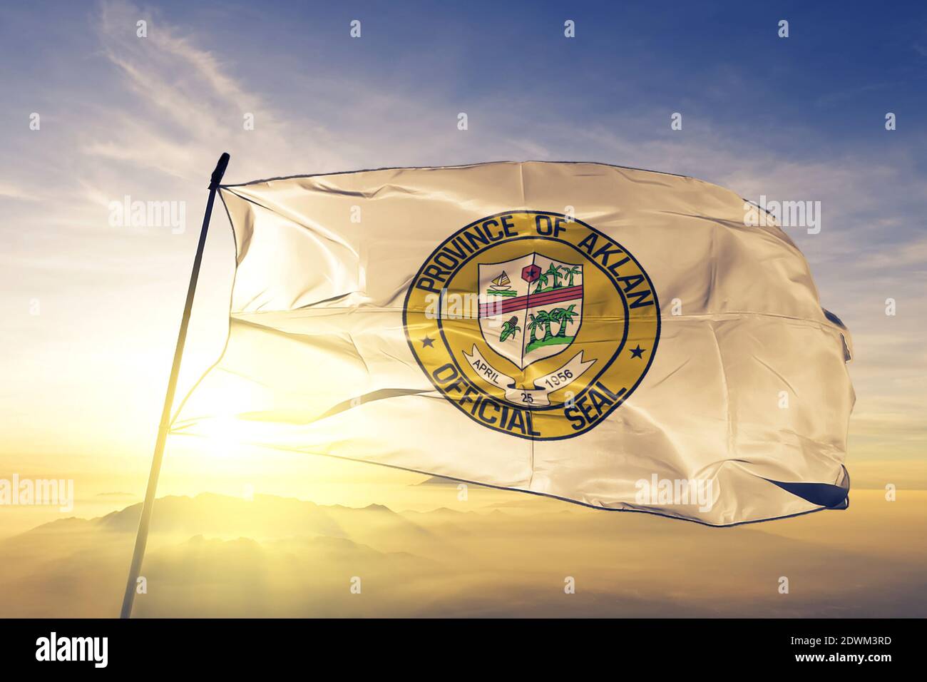 Aklan province of Philippines flag waving on the top sunrise mist fog ...
