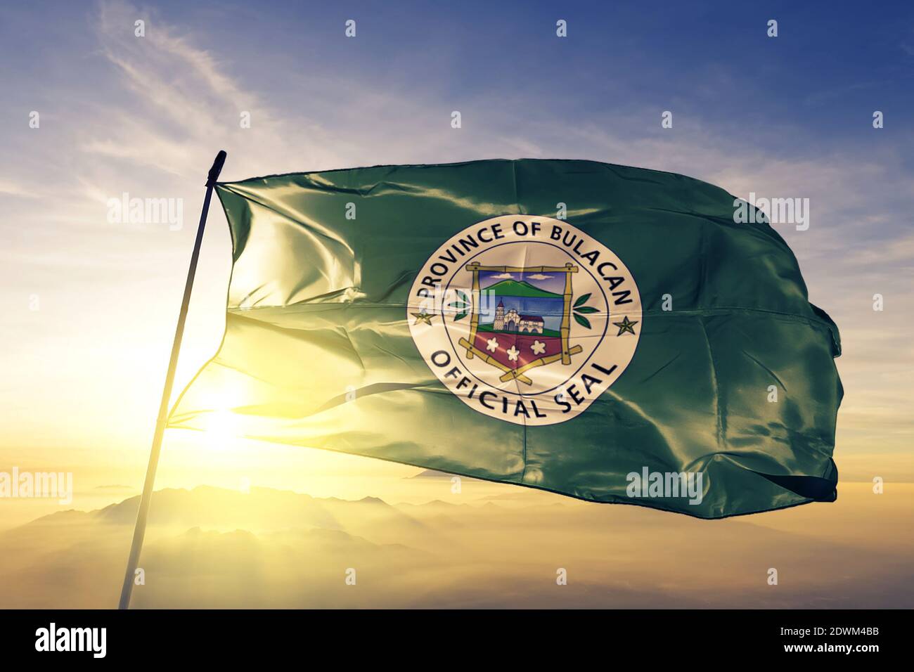 Bulacan province of Philippines flag waving on the top sunrise mist fog ...