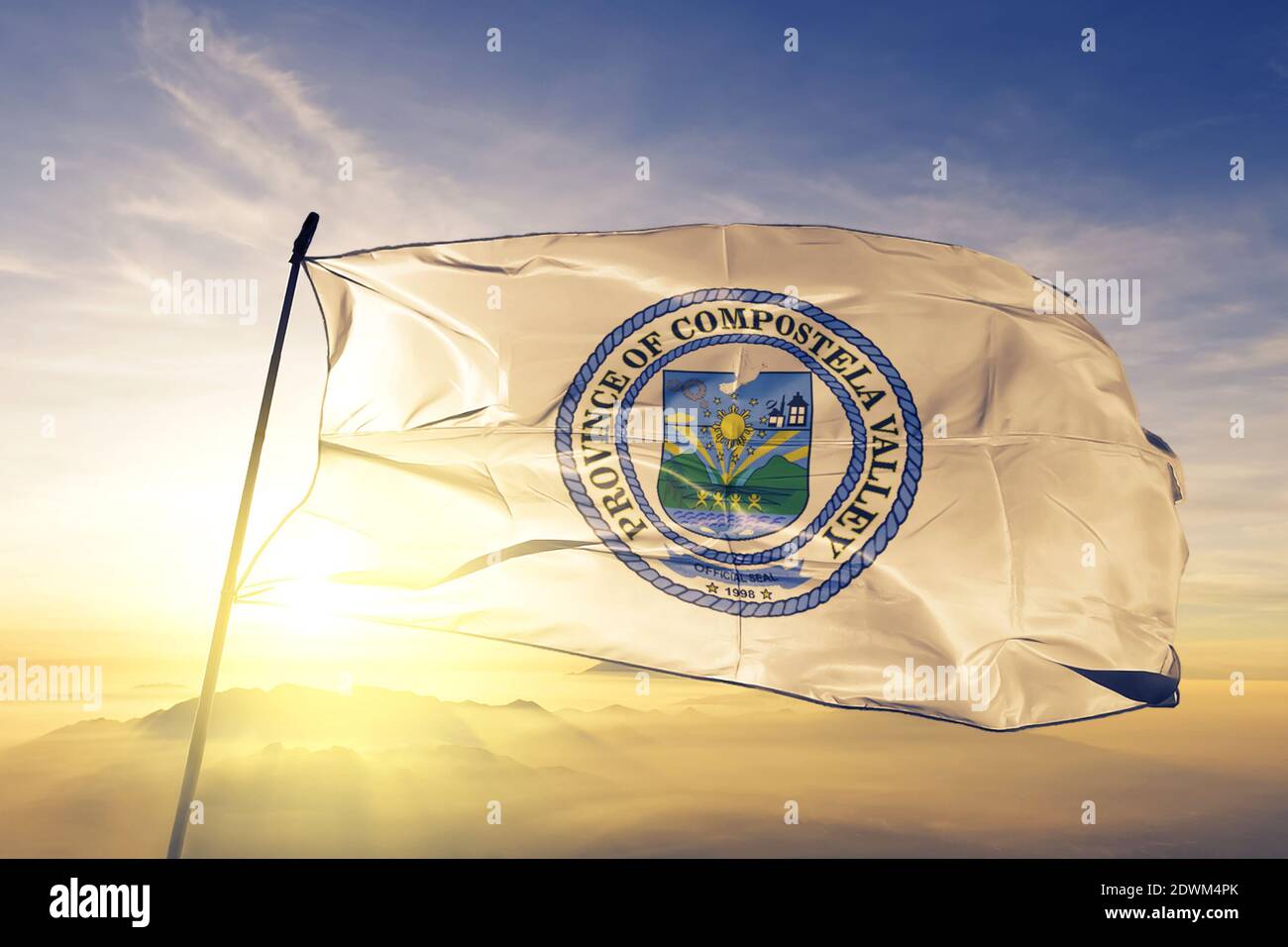 Compostela Valley province of Philippines flag waving sunrise mist fog ...