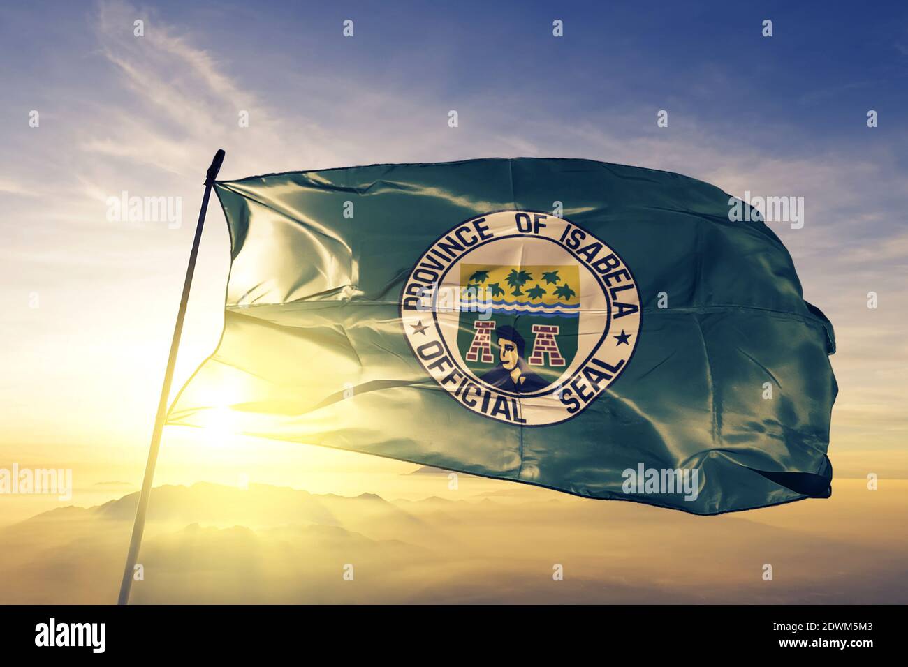 Isabela province of Philippines flag waving on the top sunrise mist fog ...