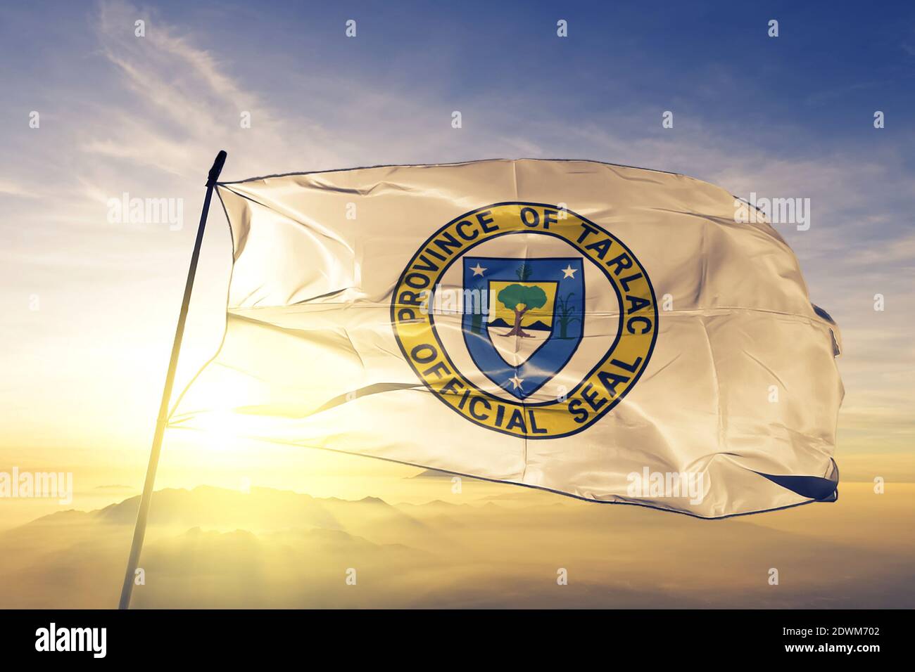 Tarlac province of Philippines flag waving on the top sunrise mist fog ...