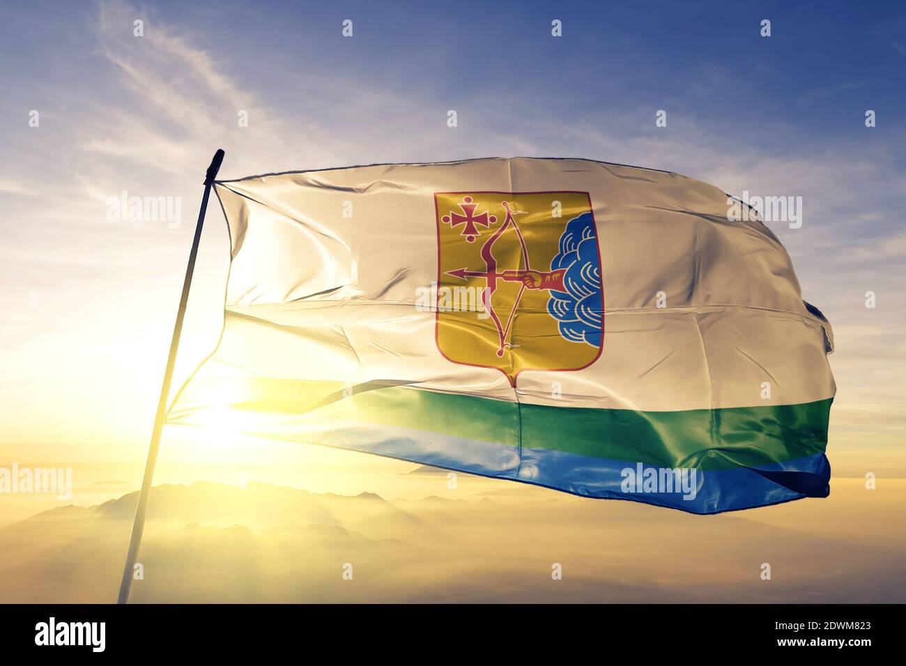 Kirov oblast of Russia flag waving on the top sunrise mist fog Stock ...
