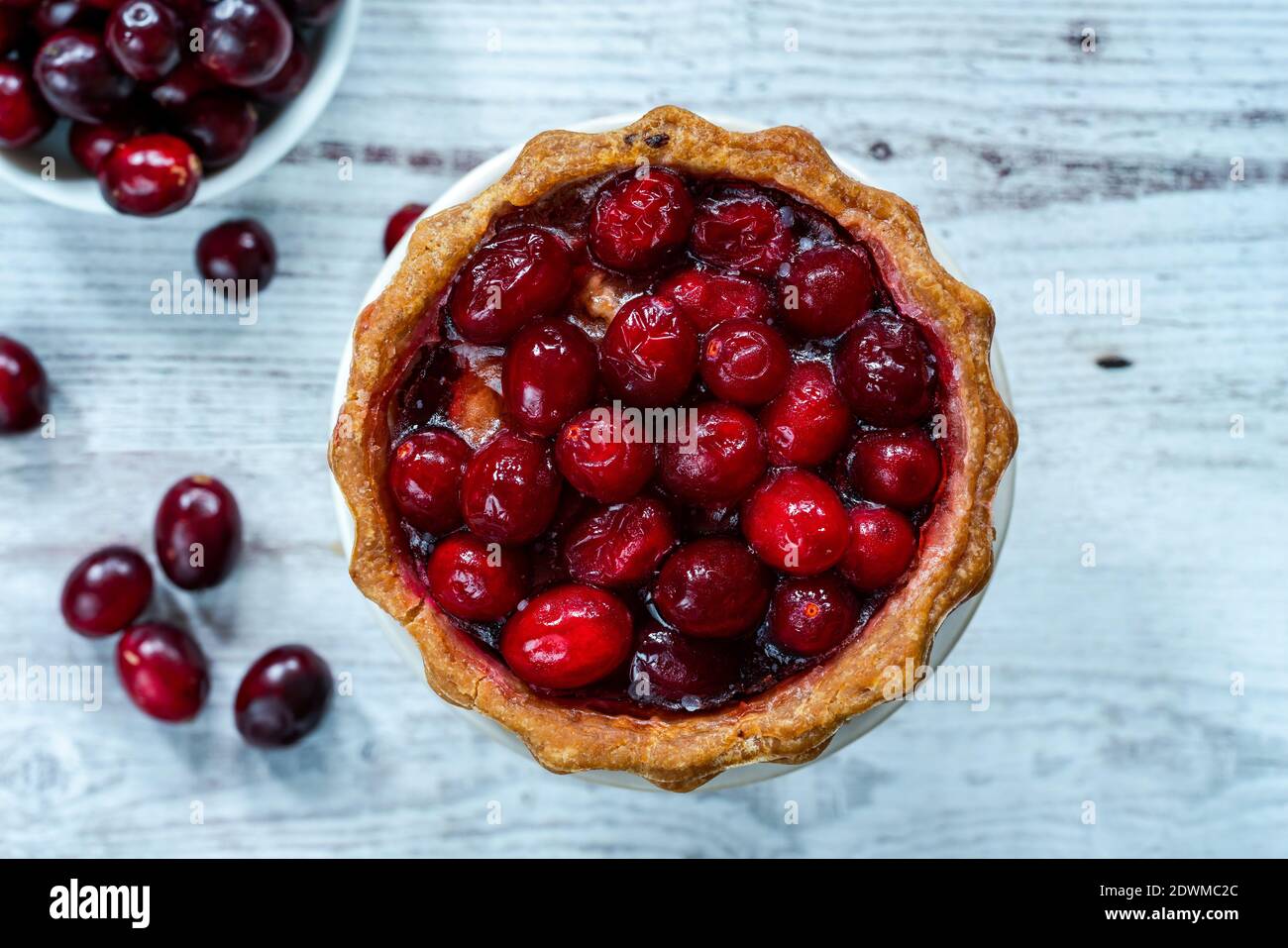 Traditional cranberry topped pork pie - overhead view Stock Photo - Alamy