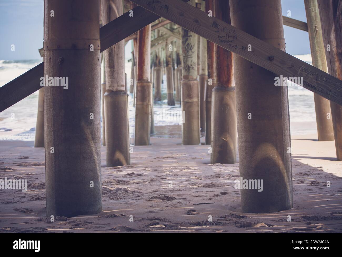 View Of Pier At Beach Stock Photo - Alamy