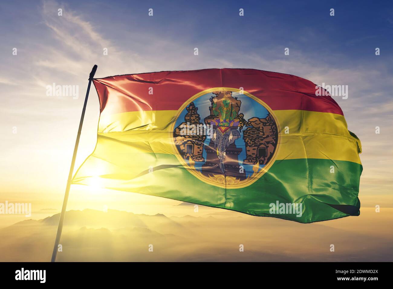 Surin province of Thailand flag waving on the top sunrise mist fog ...