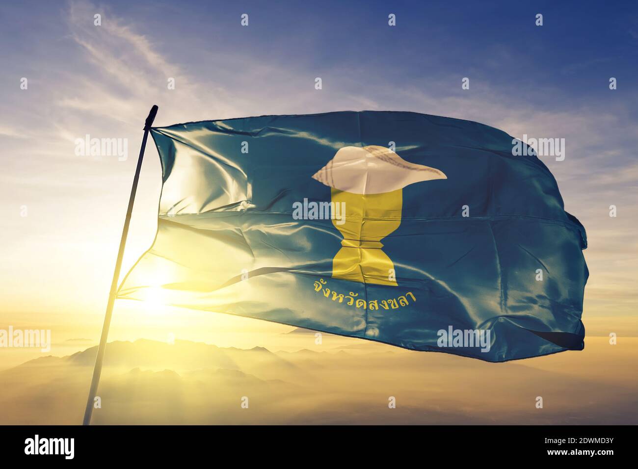 Songkhla province of Thailand flag waving on the top sunrise mist fog ...