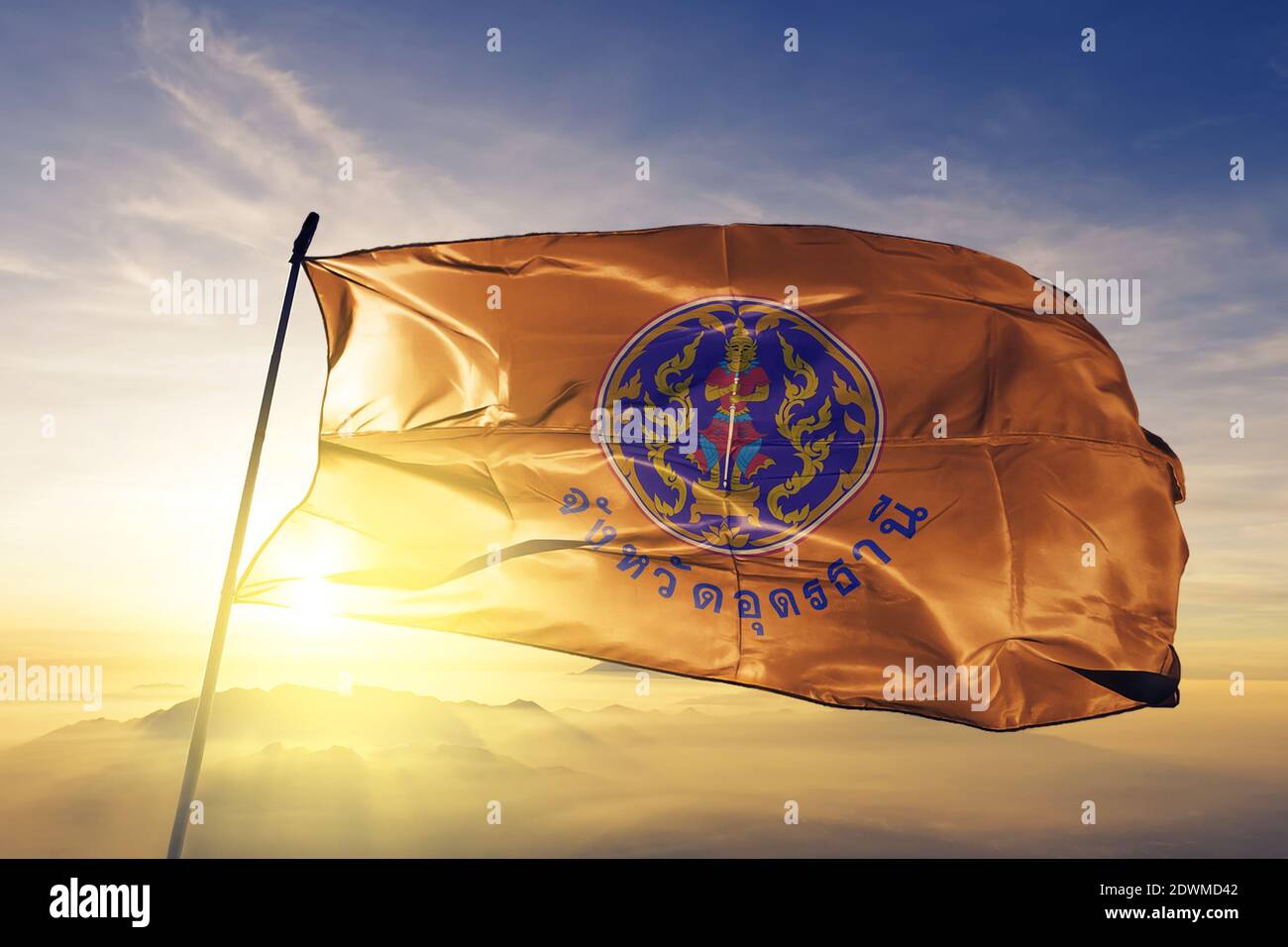 Udon Thani province of Thailand flag waving on the top sunrise mist fog ...