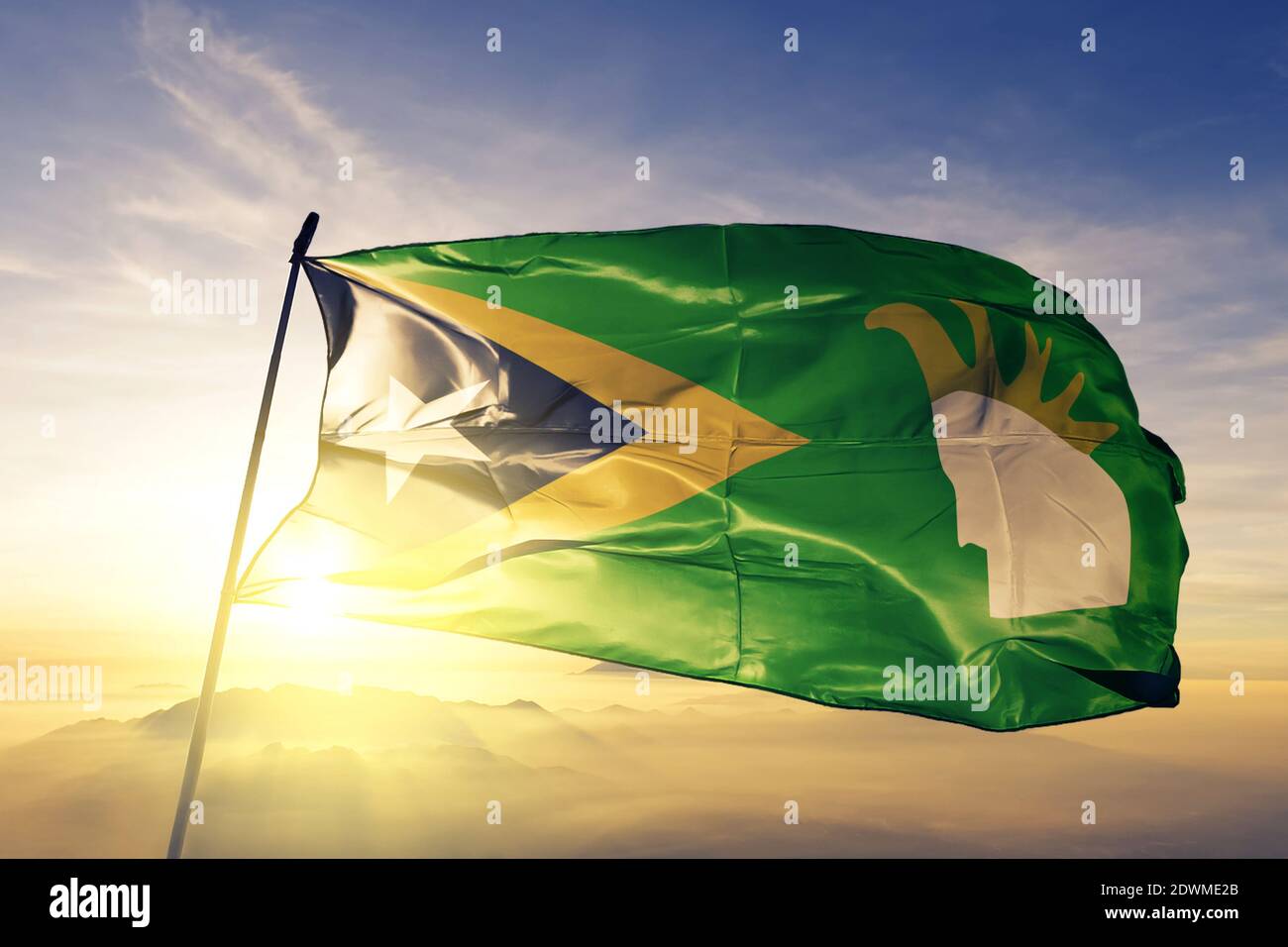 Lautem municipality of East Timor flag waving on the top sunrise mist ...